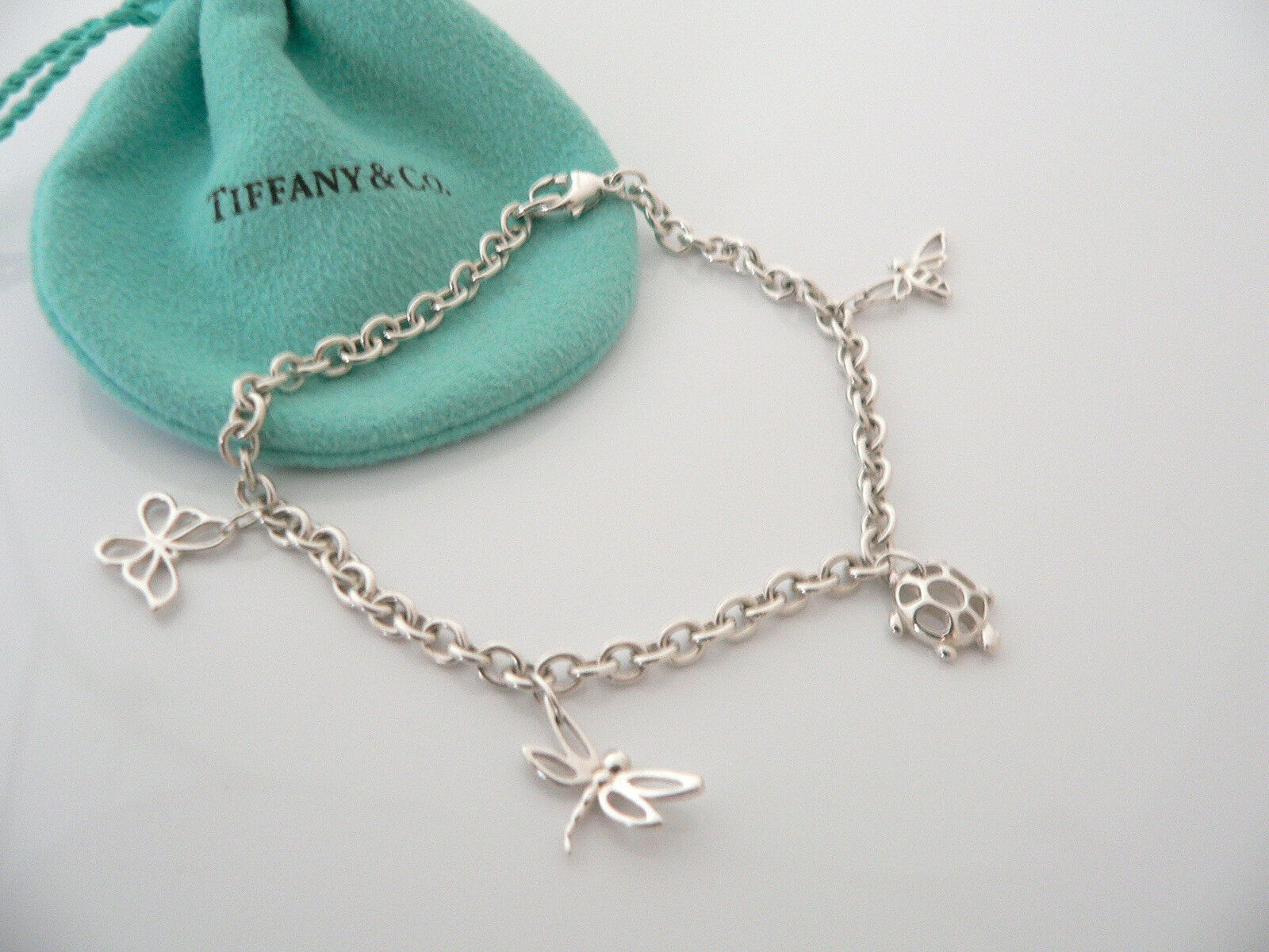 Home › Tiffany & Co Silver Butterfly Turtle Firefly Bee Bracelet Bangle ...