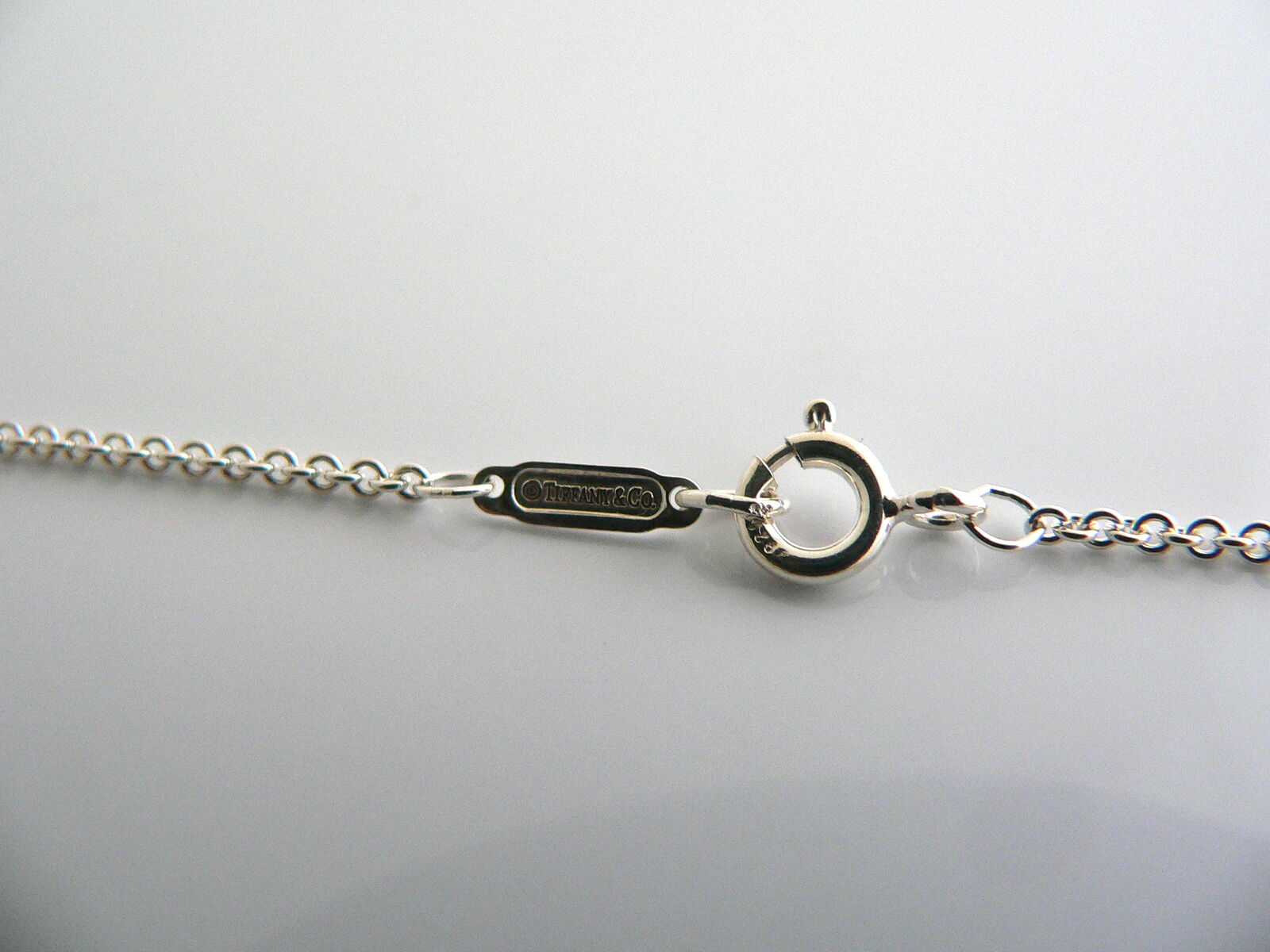 Home › Tiffany & Co Silver 18K Gold Cross Necklace Pendant Charm 18 In ...