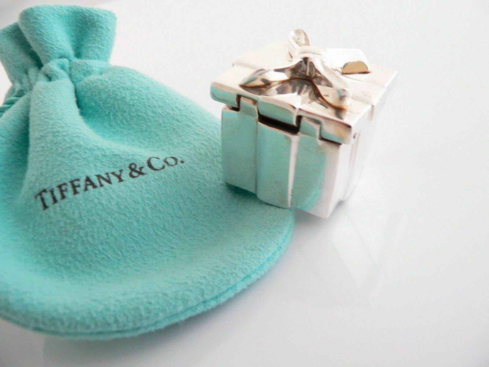Home › Tiffany & Co Silver Gift Box Pill Box Case Ribbon Bow Signature ...