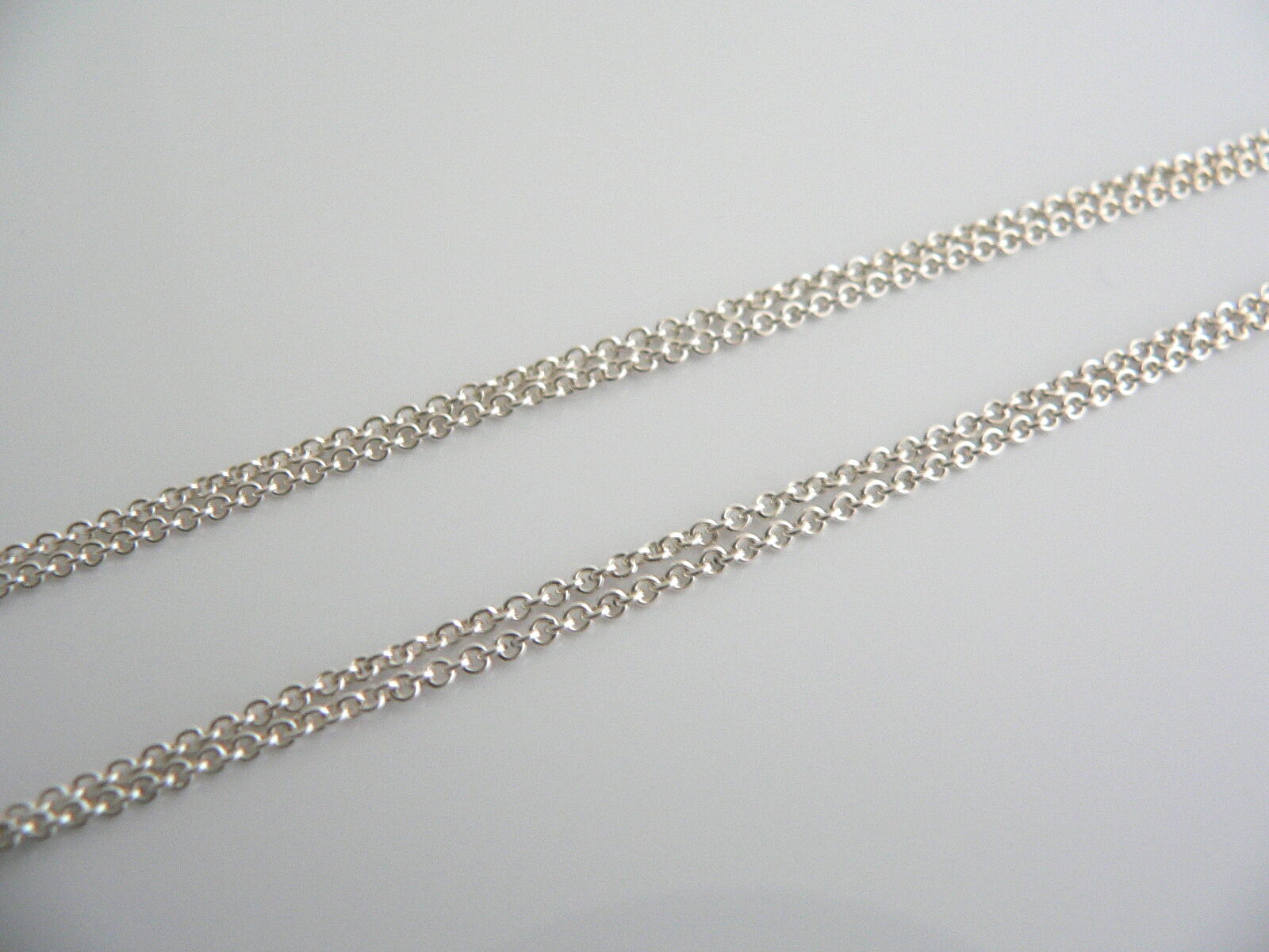 Home › Tiffany & Co Silver Infinity Figure 8 Necklace Pendant Double ...